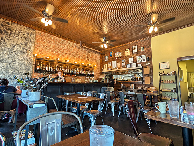 Exposed brick walls, wooden ceilings, and industrial chairs create that perfect "I've discovered something special" atmosphere that makes you want to text friends immediately.