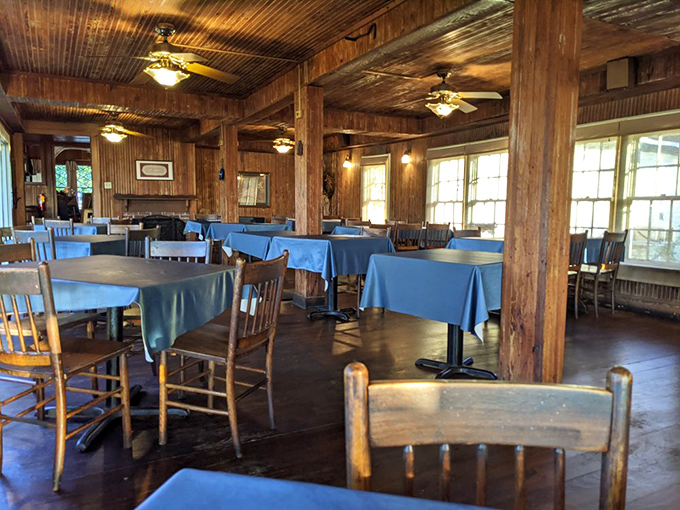 Rustic wooden beams and blue tablecloths create the perfect backdrop for seafood memories. No designer needed when the food's this good.