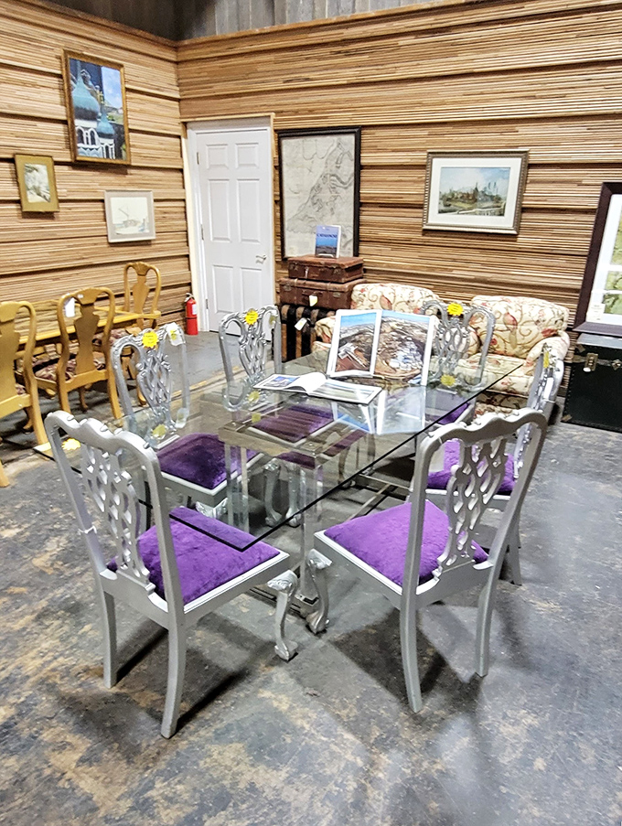 That glass-topped dining set with purple velvet chairs is giving serious "fancy dinner party" vibes from a classier era.