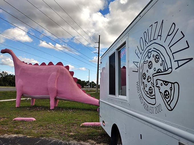 A perfect pairing: La Florizzia Pizza food truck offers delicious slices to hungry travelers who've worked up an appetite taking dinosaur selfies.