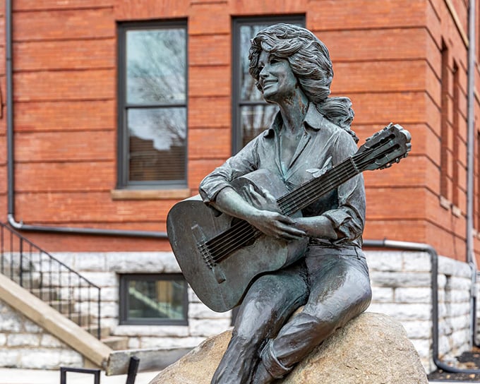 Dolly's bronze tribute captures the hometown girl who made good. Her guitar may be silent, but her legacy sings volumes throughout Sevierville.