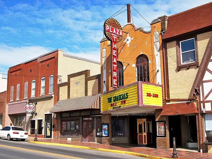 The Plaza Theatre's neon marquee doesn't just light up the street – it illuminates decades of shared community memories.