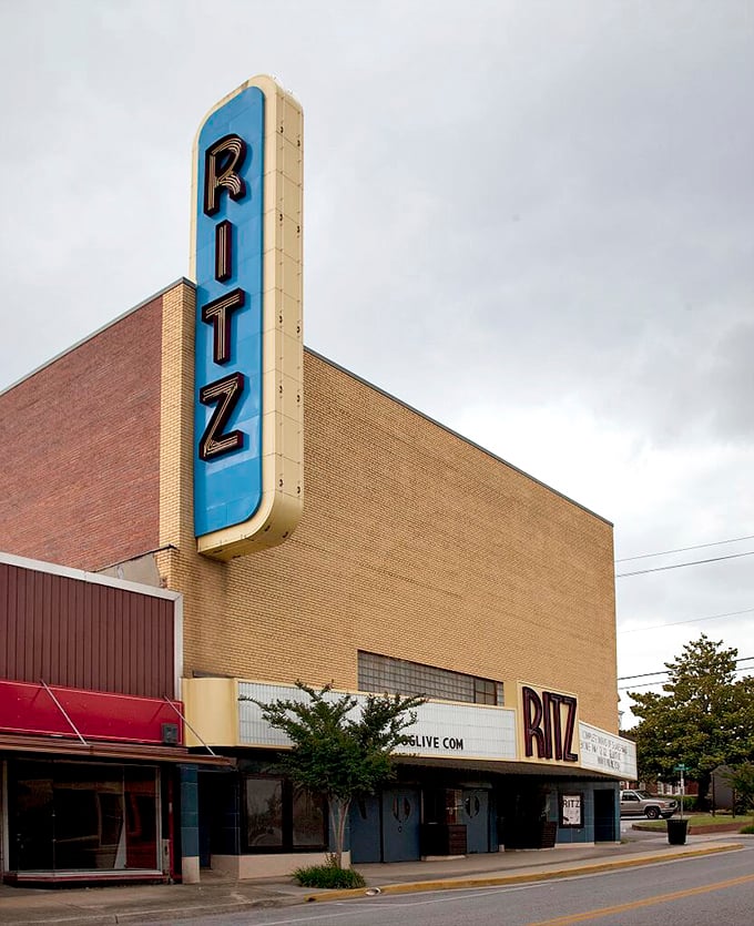 The iconic Ritz Theatre marquee stands as a blue beacon of entertainment, a nostalgic reminder that some experiences can't be streamed on Netflix.