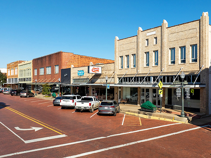 Main Street's brick-paved thoroughfare feels like driving through a living museum where modern cars meet 19th-century storefronts.