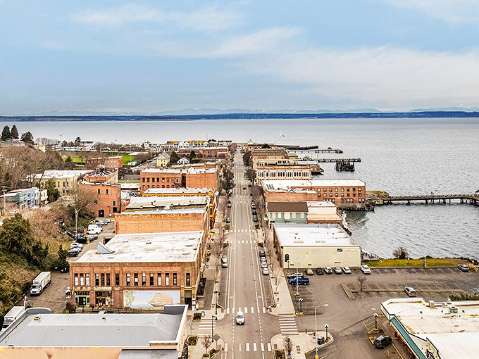 Water Street stretches toward infinity, where brick buildings from the 1880s meet the endless horizon of Port Townsend Bay.