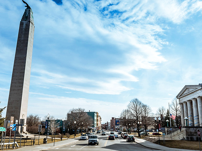 The MacDonough Monument stands tall against the sky, a silent sentinel watching over downtown Plattsburgh since 1926. History reaching skyward.