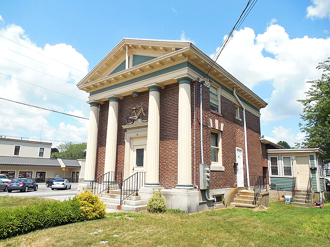 This stately brick building with impressive columns isn't compensating for anything—it's just historically significant and knows it.