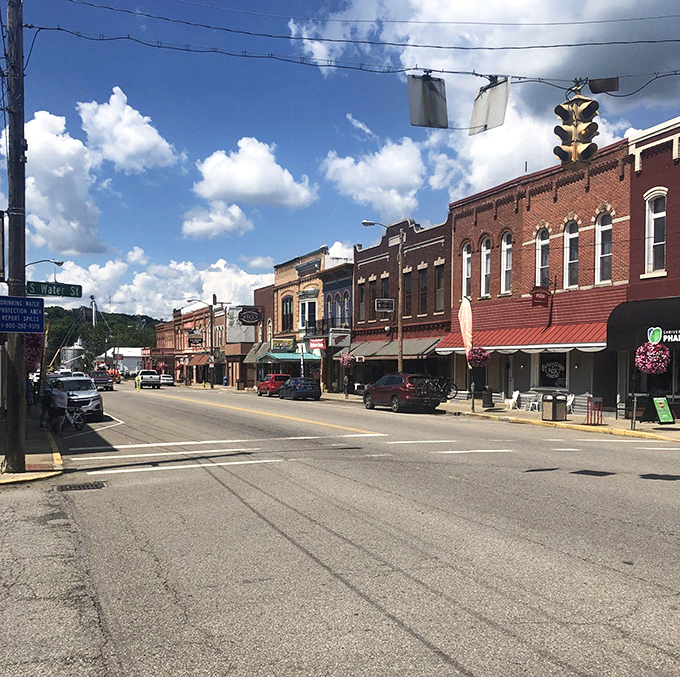Main Street Loudonville basks under Ohio's big sky, where time slows down and conversations matter more than notifications.