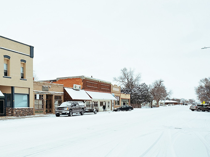 Winter transforms Kersey's main street into a Norman Rockwell painting come to life, where snow-covered sidewalks lead to warm welcomes inside.