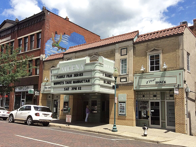 The historic Athena Cinema stands as Athens' cultural heartbeat, where indie films and buttery popcorn create memories in a setting straight from another era.
