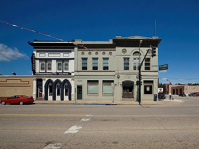 Mandan's cityscape unfolds like a storybook, where historic buildings stand proudly against that impossibly blue North Dakota sky.