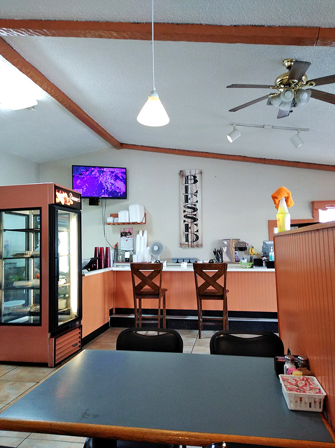 The "BEER" sign says everything you need to know about Peggy's philosophy: straightforward pleasures, no explanation needed.