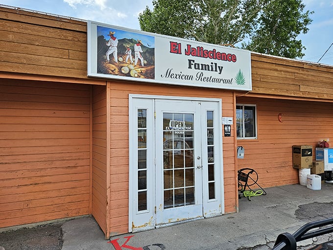 El Jaliscience's bright orange exterior is like a sunset-colored beacon for hungry travelers seeking authentic Mexican flavors in the heart of Wyoming.
