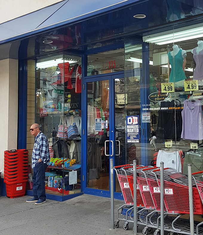 Red shopping carts stand ready for your treasure hunt adventure. Like Wonka's golden ticket, that blue entrance promises wonders inside.
