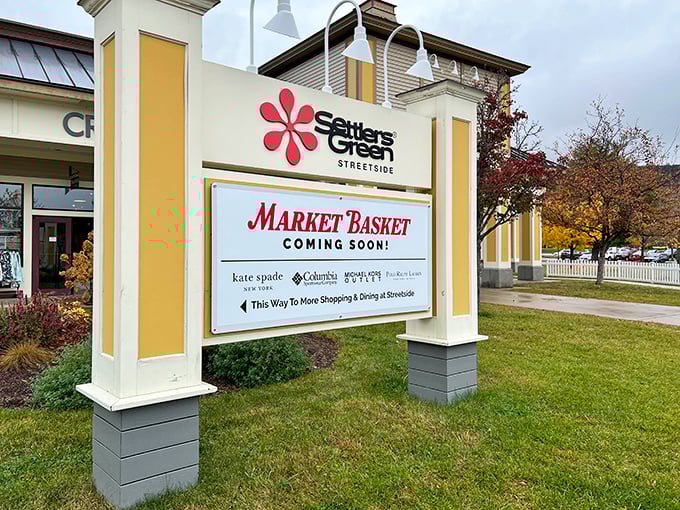 The Settlers Green Streetside sign promises treasures ahead with the subtlety of a game show host announcing what's behind door number three.