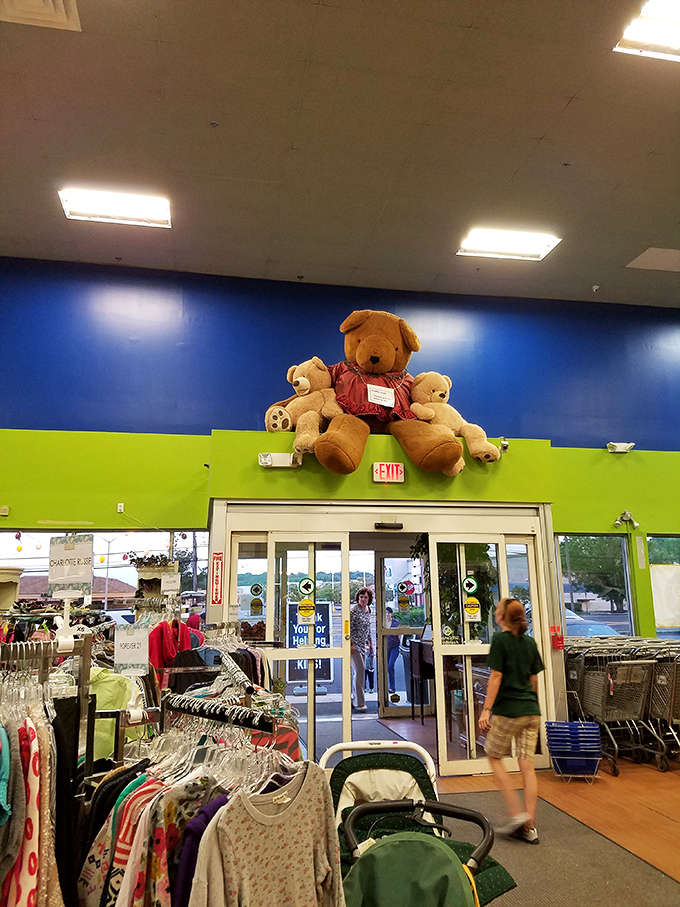 Giant teddy bears stand guard over the entrance like plush sentinels, welcoming shoppers to this wonderland of secondhand delights.