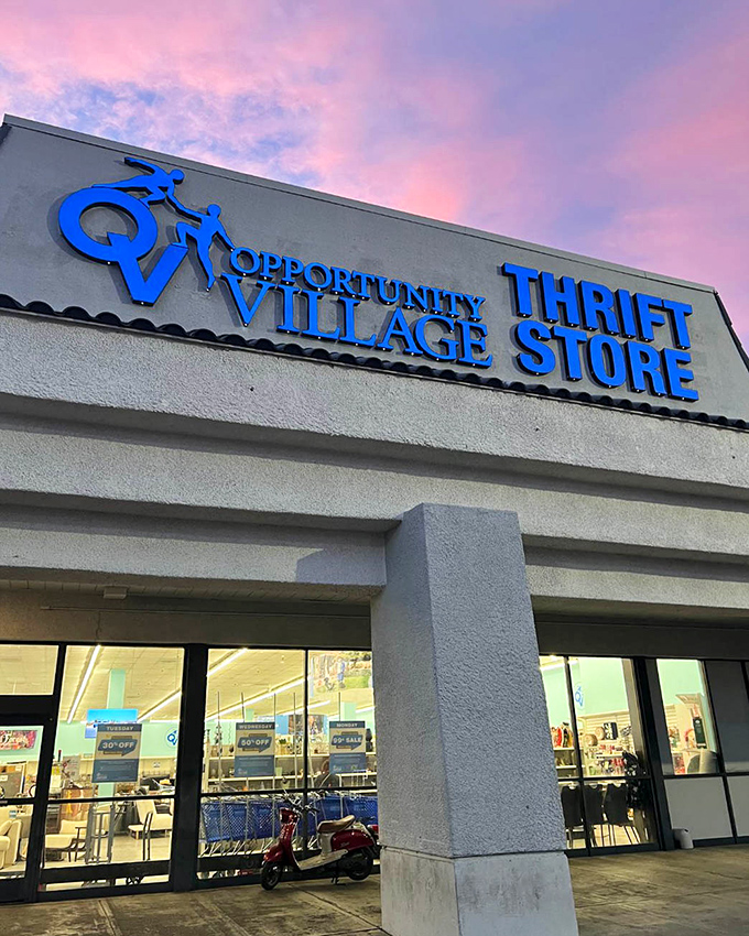 Bathed in Vegas sunset hues, the blue signage beckons bargain hunters like a neon lighthouse guiding ships to secondhand salvation.