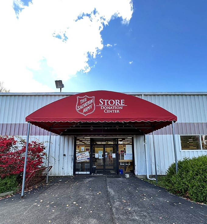 The iconic red awning beckons bargain hunters like a lighthouse guiding ships to sartorial salvation. Adventure awaits just beyond those doors.