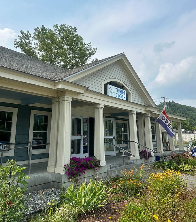 The "OPEN" flag might as well say "OPPORTUNITY" &ndash; colorful garden beds welcome bargain hunters to this secondhand sanctuary.