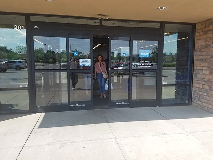 The gateway to thrifting paradise. These sliding doors might look ordinary, but they're actually portals to a world where $45 fills an entire shopping cart.