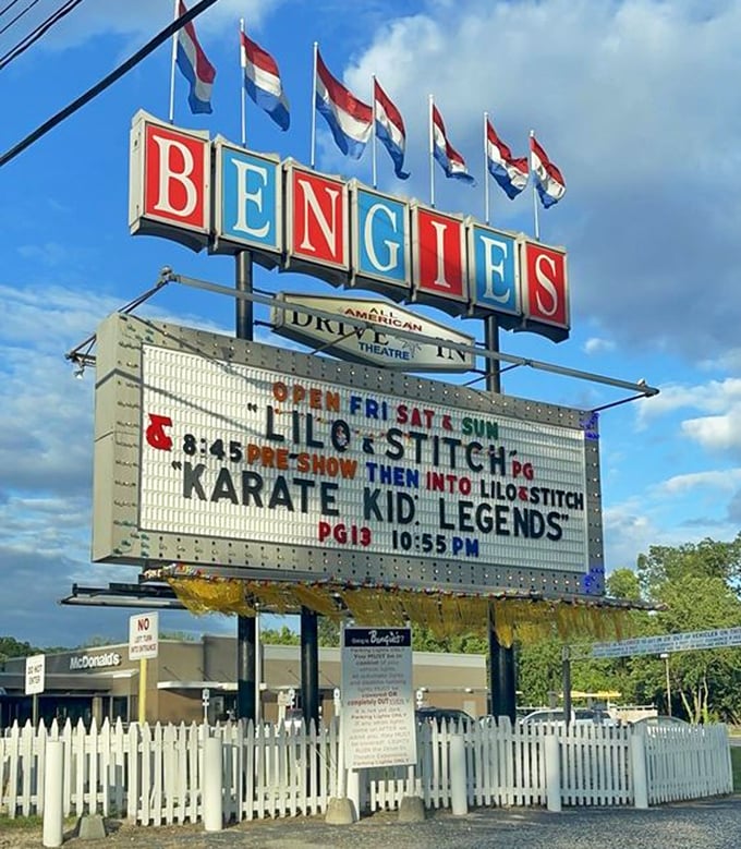 The iconic marquee stands tall against Maryland skies, a colorful beacon promising double features and nostalgic nights.