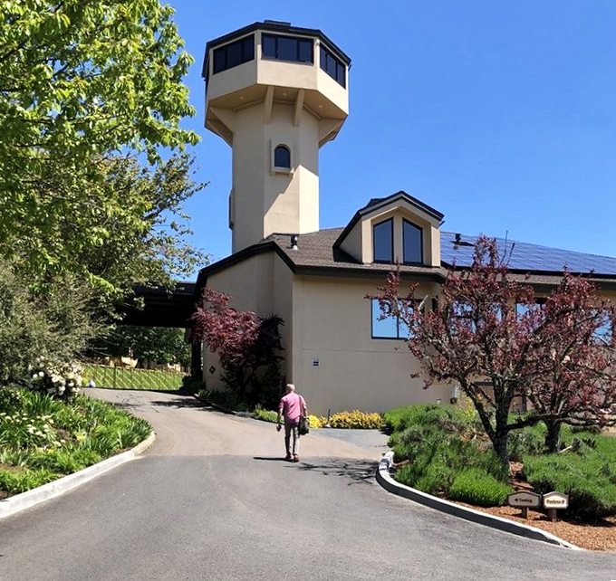 That iconic tower beckons visitors up the winding drive to Oregon's wine country treasure.