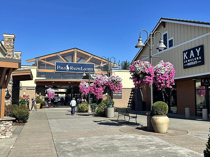 Nature meets commerce as hanging flower baskets add a splash of Pacific Northwest charm to your discount-hunting adventure.