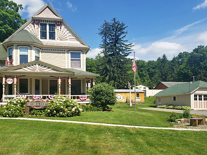 Victorian elegance meets small-town hospitality at the Historical Society, where the porch practically begs you to sit a spell with lemonade.