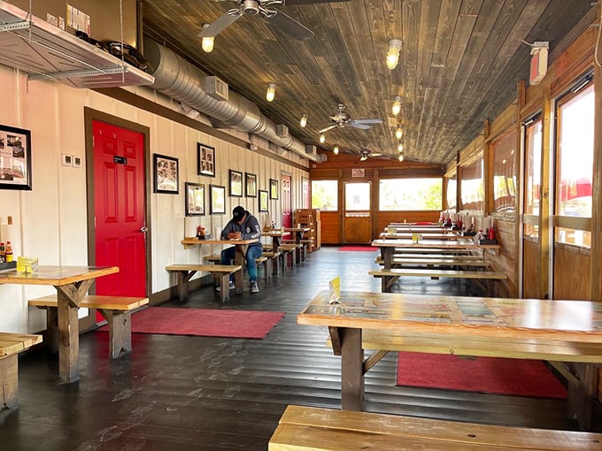 Rustic charm meets seafood perfection inside Stewby's, where wooden picnic tables and bench seating invite you to forget your manners and dig in.