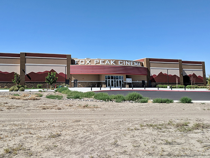 Fox Peak Cinema proves you don't need big-city prices for the big-screen experience. Those mountain silhouettes aren't just decorative&mdash;they're prophetic.