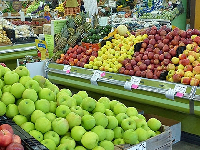 Fresh produce piled high in a rainbow of colors that makes your local grocery store look downright depressing.