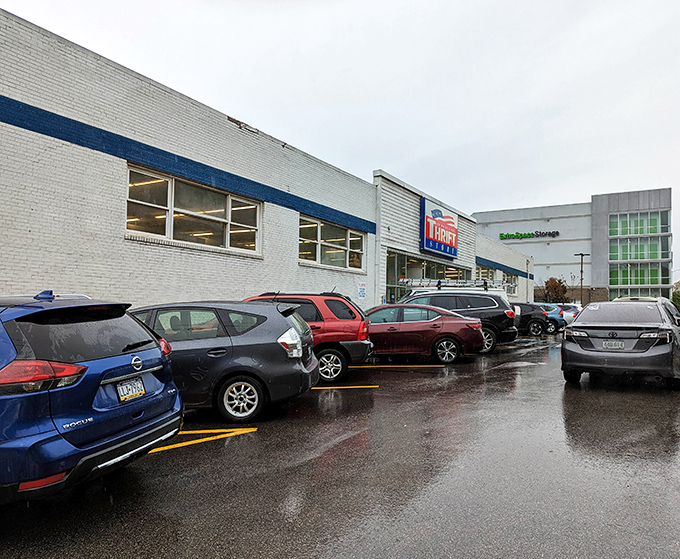 Even on rainy days, the parking lot fills with treasure seekers. That white brick exterior with blue trim? It's Pittsburgh's version of retail Narnia.