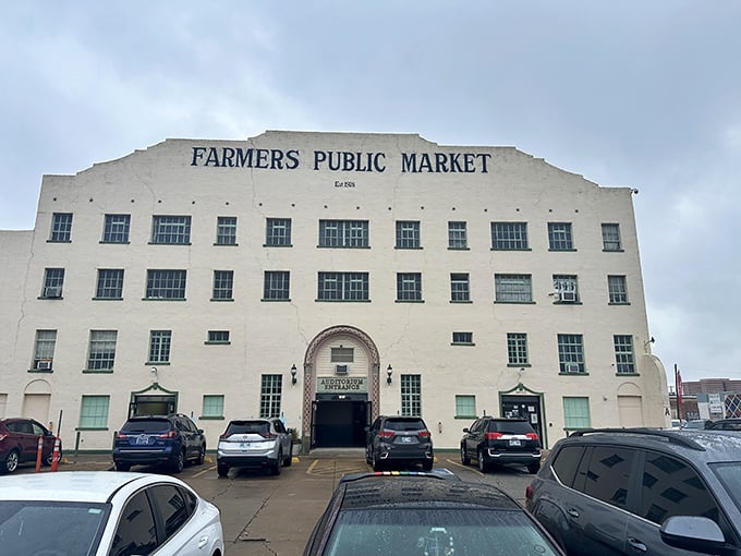 From this angle, the market's imposing white exterior resembles a grand ocean liner docked in the heart of Oklahoma City, ready to transport you on a culinary journey.