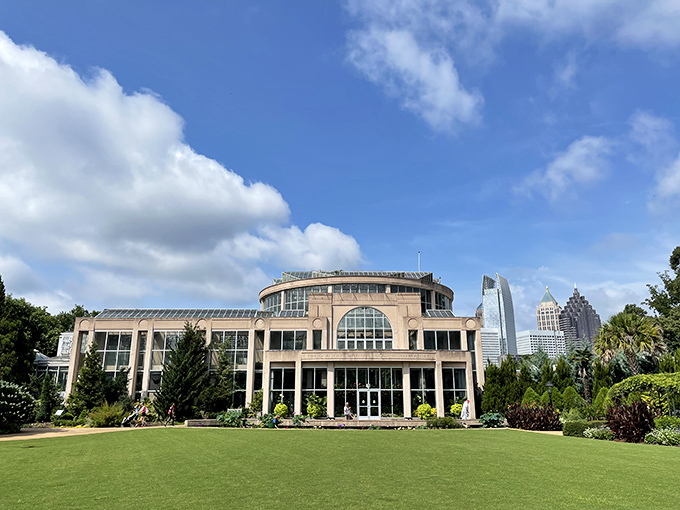 Where architecture meets horticulture &ndash; the garden's main building stands like a botanical cathedral against Atlanta's skyline.