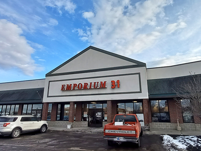 Winter or summer, rain or shine, the bright red lettering of Emporium 31 serves as a beacon for collectors and nostalgia-hunters alike.