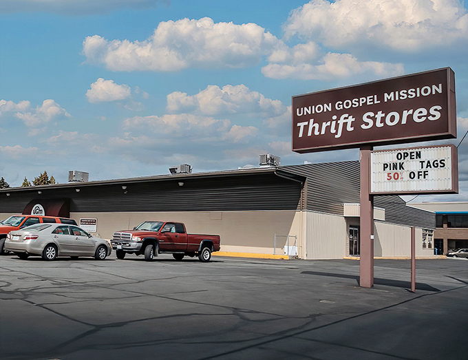 The welcoming red awning and clear signage make this entrance more inviting than many upscale boutiques charging ten times the price.