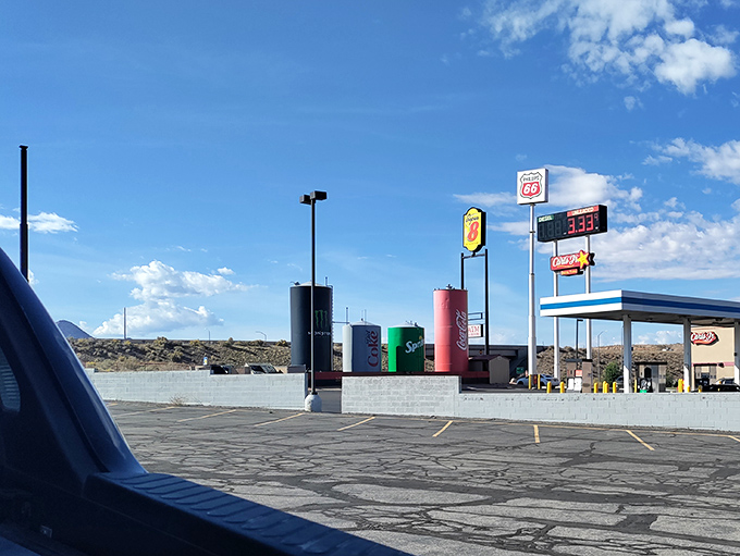America's obsession with supersizing reaches its logical conclusion at Salina's travel stop, where soda tanks tower against Utah's brilliant blue skies.