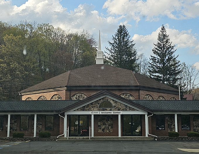 The Gospel Tabernacle Welcome Center stands as a testament to small-town spirituality, its steeple reaching skyward like a beacon for weary travelers.