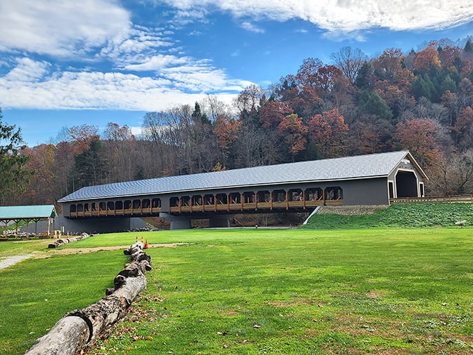 Fall's paintbrush transforms the backdrop of this covered bridge into nature's gallery, where every angle deserves its own frame on your living room wall.