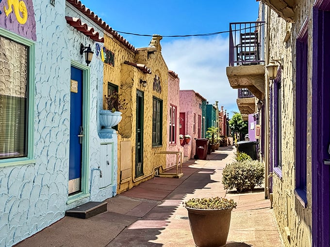 These pastel-hued Venetian Court cottages aren't just Instagram gold&mdash;they're living history with a beachfront address that would make any real estate agent weep with joy.