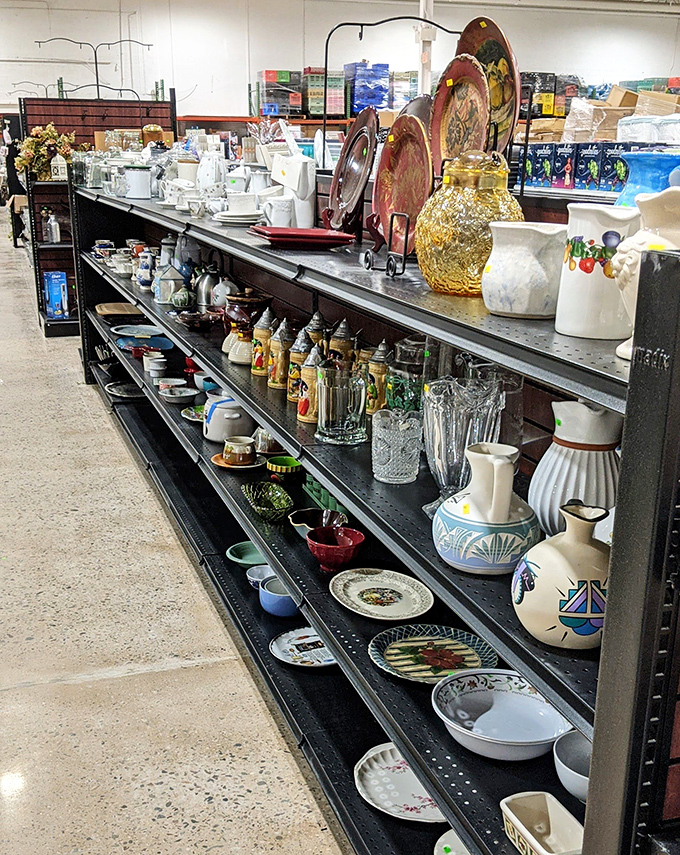 Shelves lined with glassware and ceramics tell stories of dinner parties past, waiting for their second act in your home.