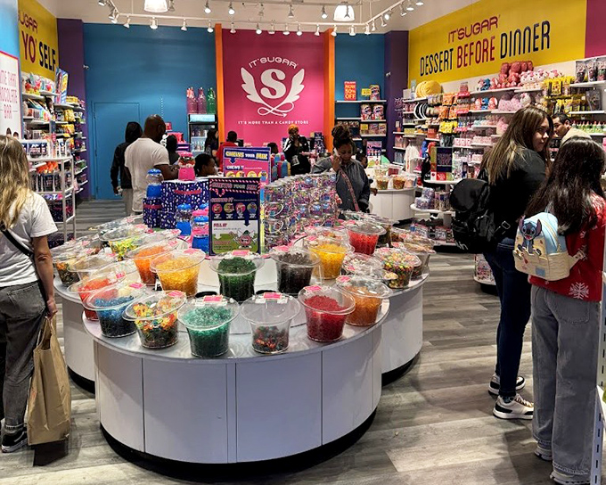 IT'SUGAR isn't just a candy store&mdash;it's a technicolor playground where adults rediscover their inner eight-year-old amid mountains of gummies and chocolate-covered everything.