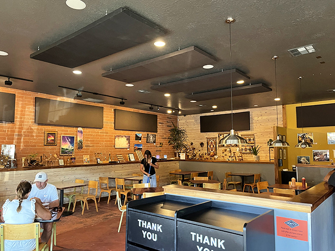 Modern comfort meets casual dining in a space where wood tones and natural light create the perfect burger-eating atmosphere.