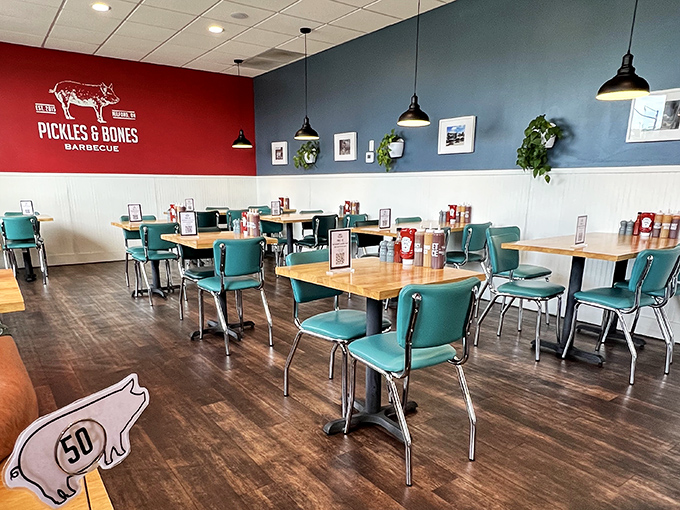 Retro teal chairs and red walls create the perfect backdrop for barbecue bliss. No white tablecloths needed when the food does all the talking.