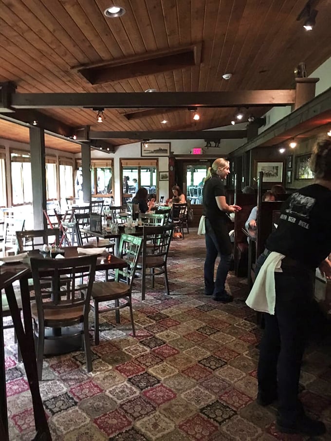 Inside, wooden beams and patchwork carpet create that rare atmosphere where strangers become friends and calories don't count.