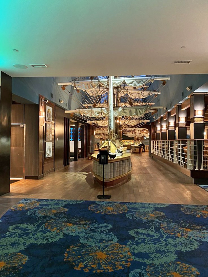 Step inside and you're greeted by a magnificent ship model suspended from the ceiling—nautical theater that sets the stage for the oceanic feast awaiting your eager appetite.