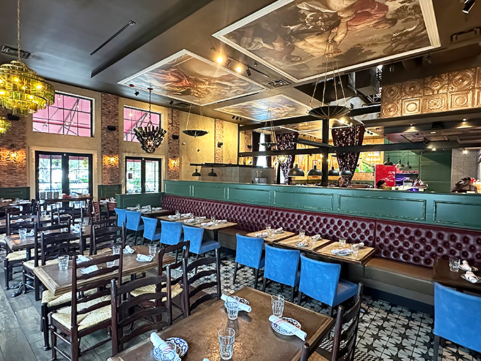 Those ceiling murals and teal banquettes create an atmosphere that's somehow both upscale and completely welcoming to hungry humans.