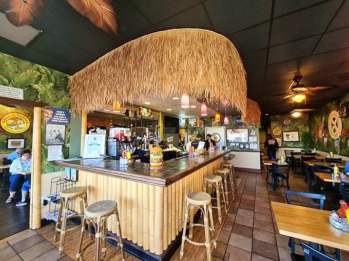 Step inside and you're transported to a tropical burger paradise, complete with thatched roof and good vibes.
