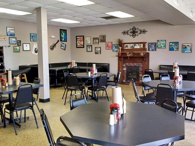 Simple tables, cozy fireplace, and walls adorned with local art – Monroe's dining room says, "Sit down, get comfortable, and prepare for a meat marathon."