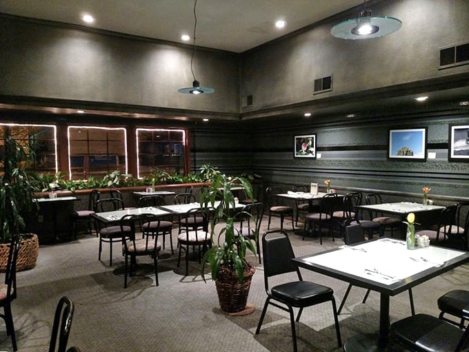 Step inside to a dining room that strikes the perfect balance between elegant and approachable. Those potted plants aren't just for show&mdash;they're your dinner companions.